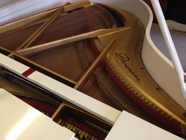 Danemann grand piano in a White Satin cabinet