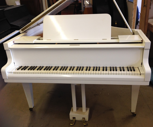Danemann grand piano in a White Satin cabinet